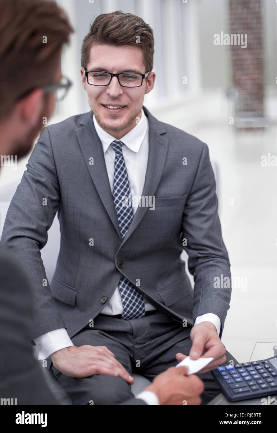 close up.business partners exchanging business cards Stock Photo - Alamy