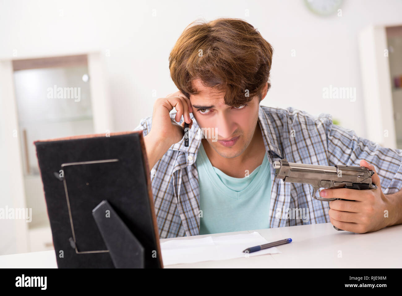 Man crying broken phone hi-res stock photography and images - Alamy