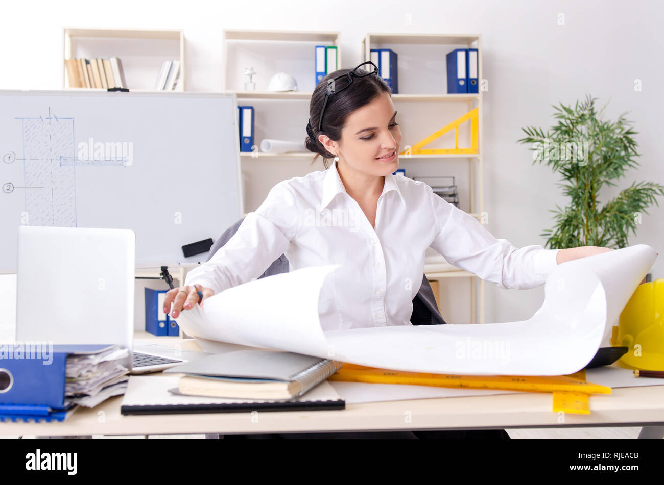 Female architect drafting blueprint ruler hi-res stock photography and ...