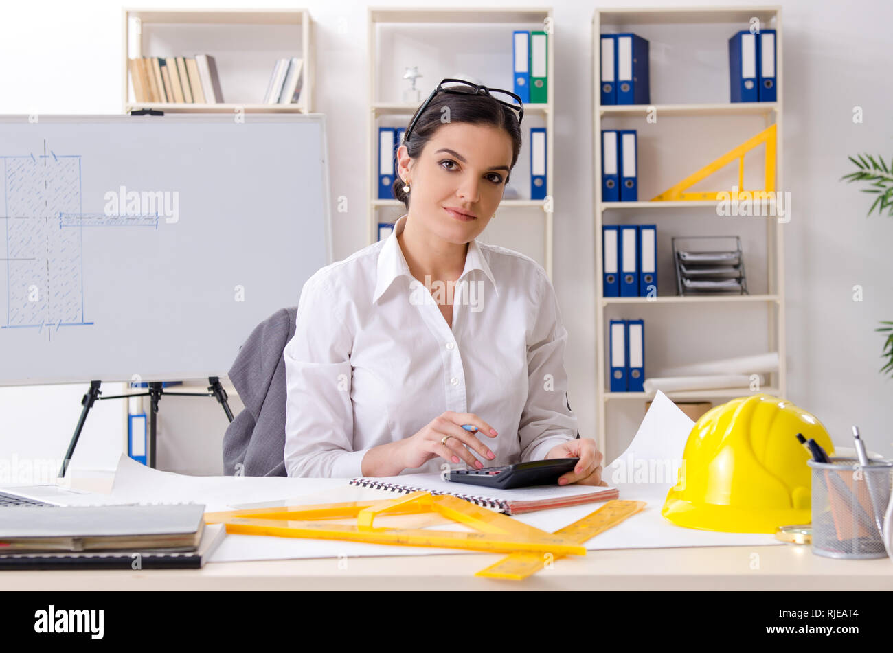 Female construction manager counting hi-res stock photography and ...