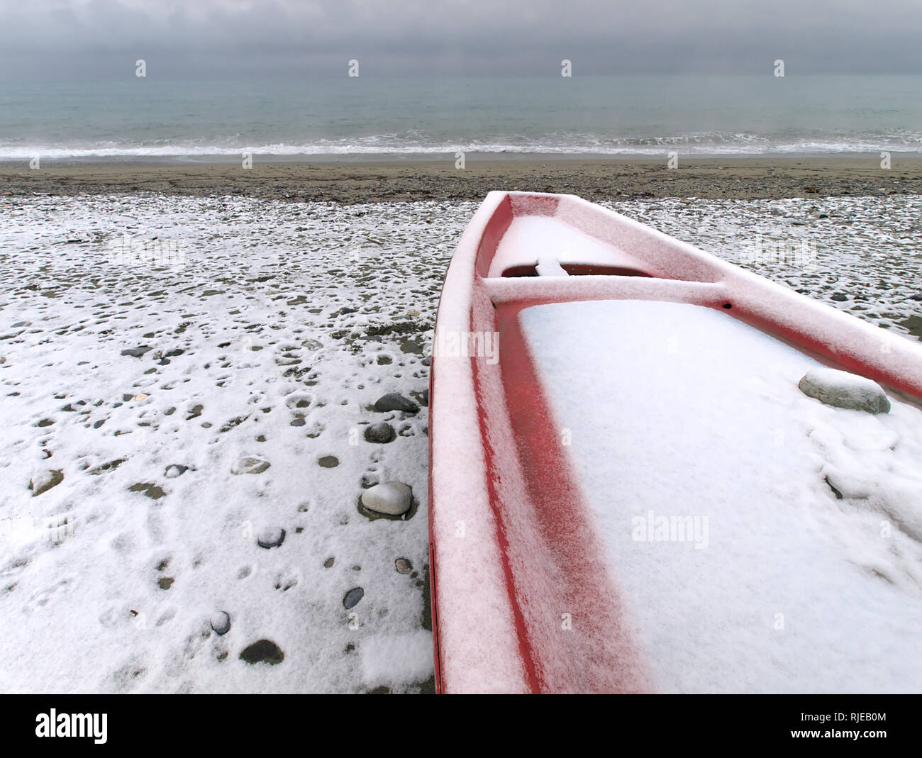 Boat on the beach in winter hi-res stock photography and images - Alamy