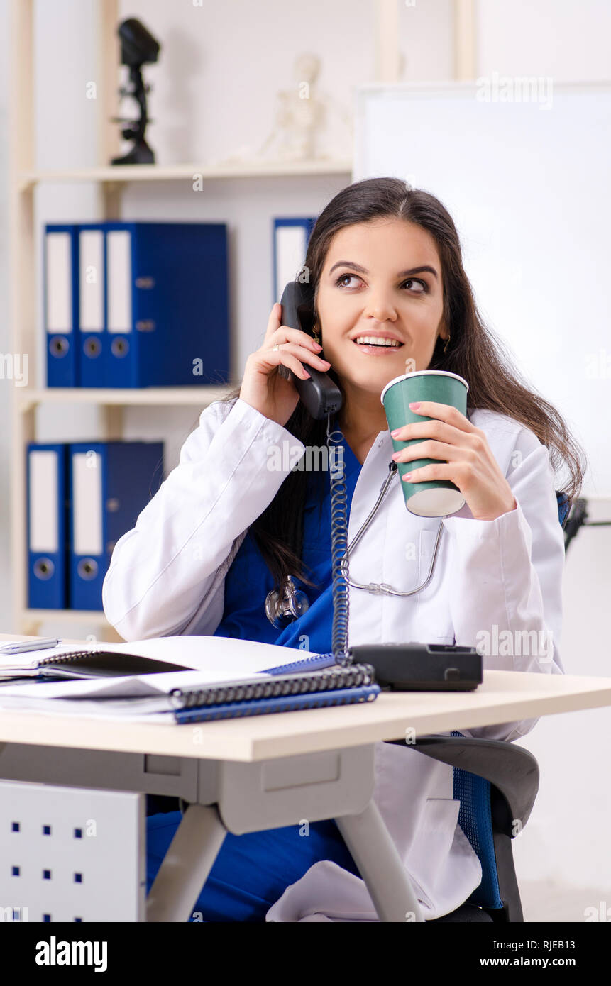 Female doctor working in the clinic Stock Photo - Alamy