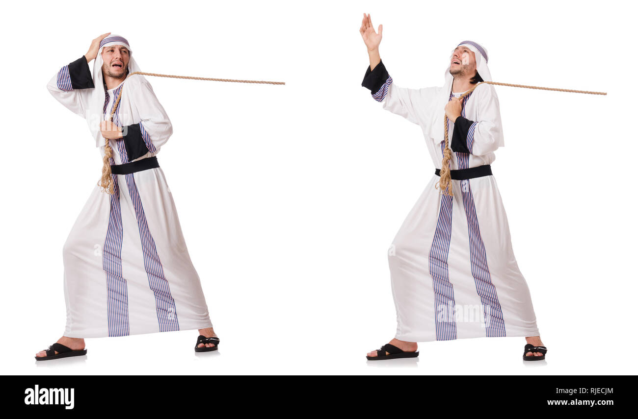 Arab man pulling rope in tug of war concept Stock Photo - Alamy