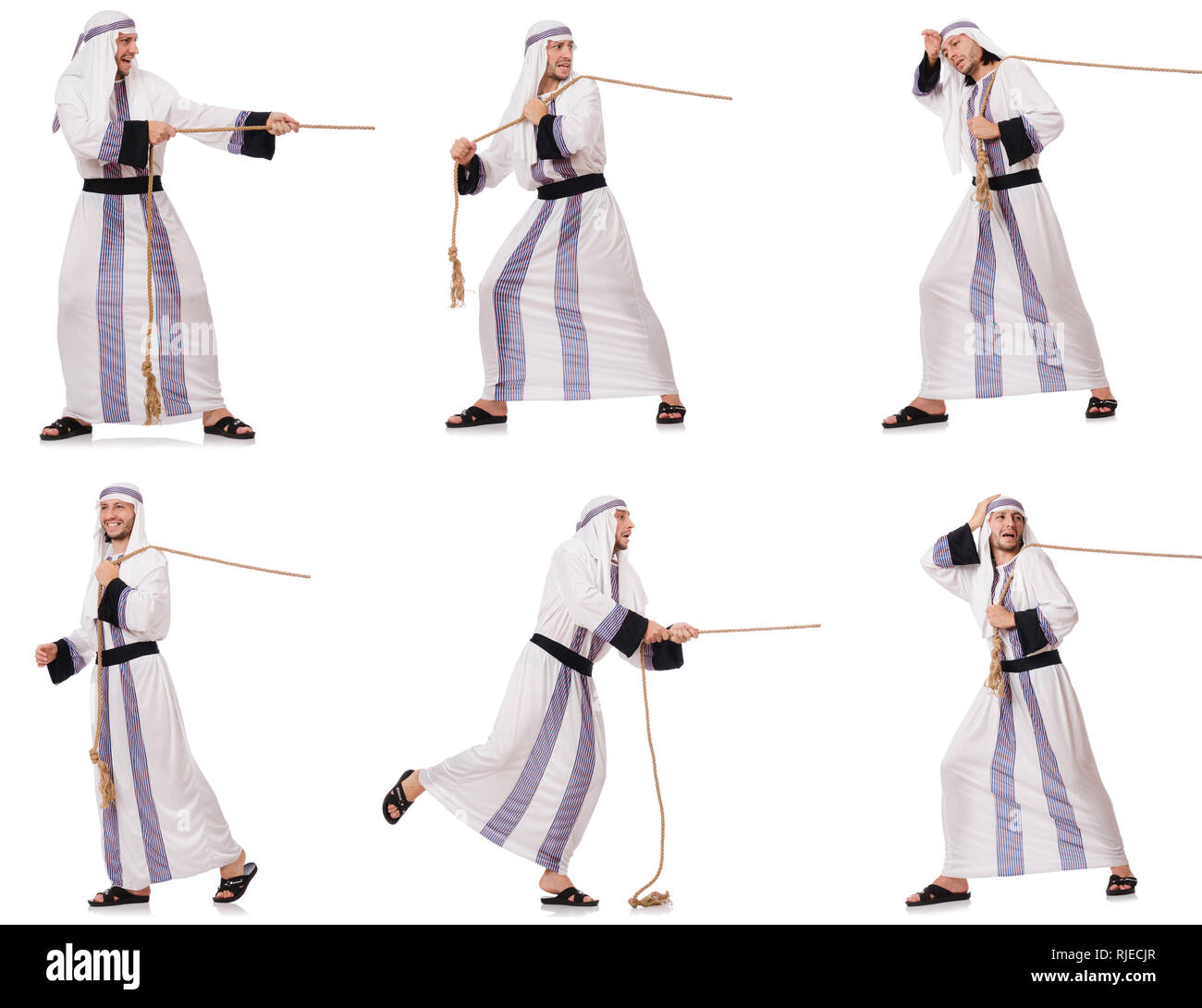 Arab man pulling rope in tug of war concept Stock Photo - Alamy