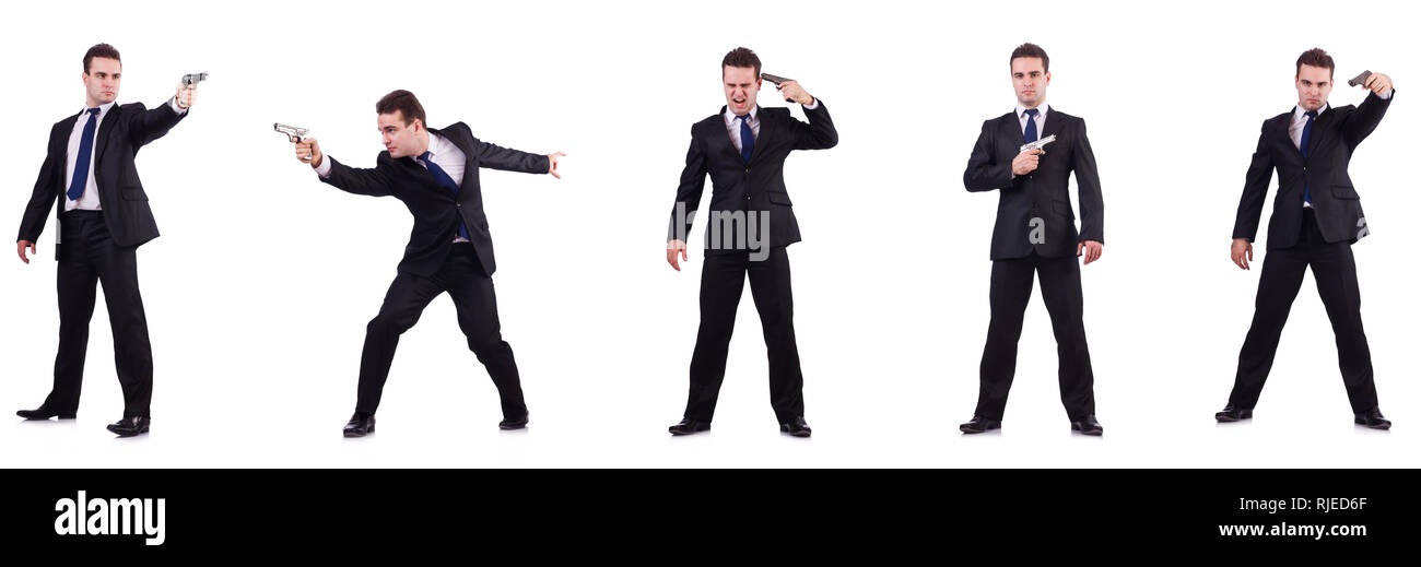 Man in suit with gun isolated on white Stock Photo - Alamy