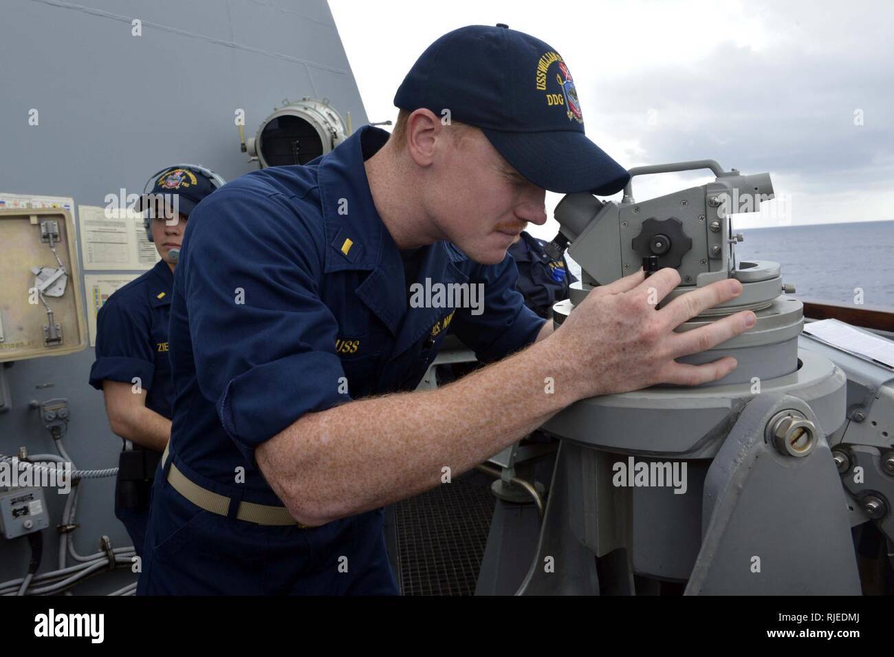 PACIFIC OCEAN (Jan. 30, 2013) Ensign Erich Buss looks at the horizon ...