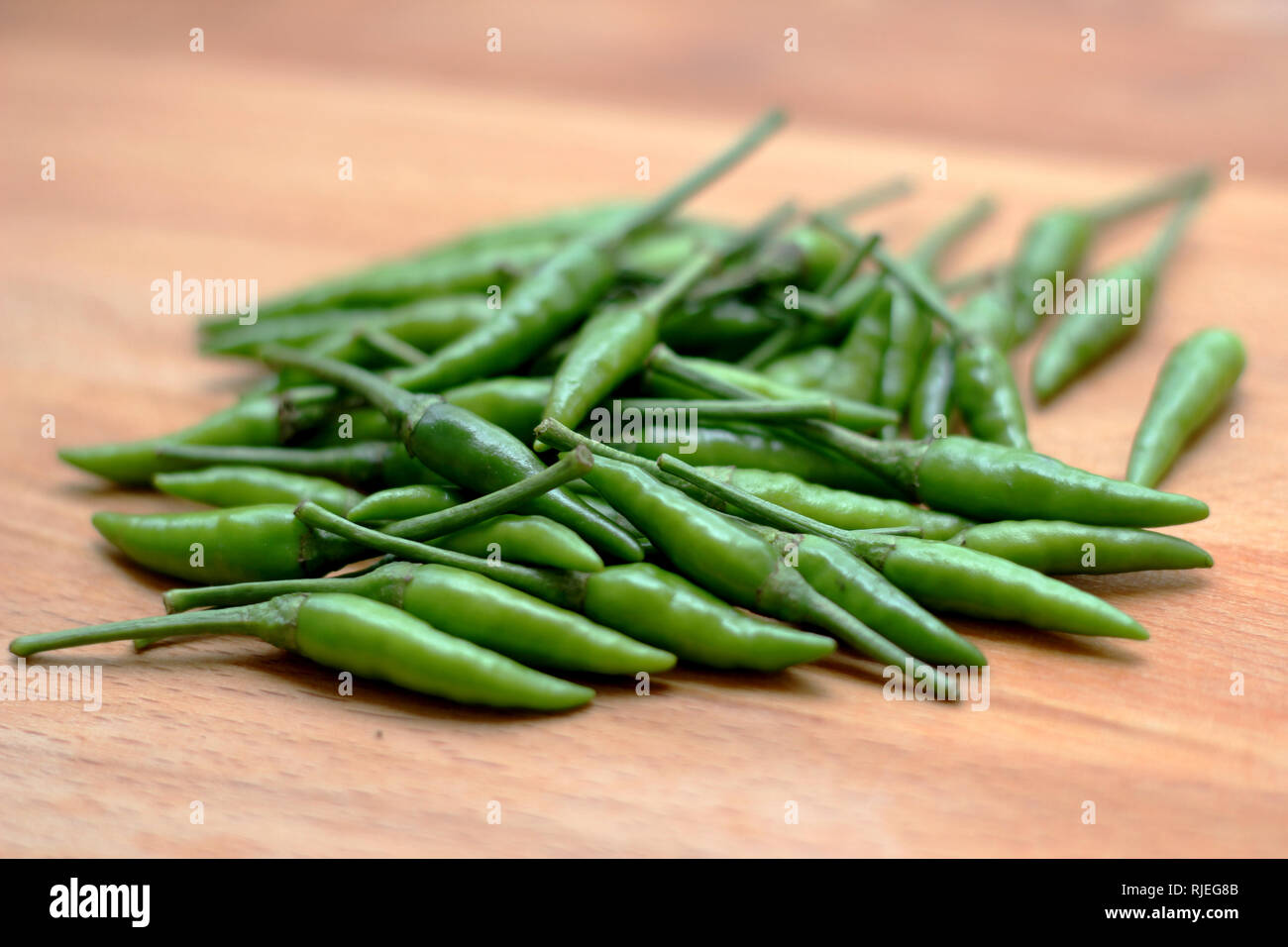 Cooking with green chillies hi-res stock photography and images - Alamy