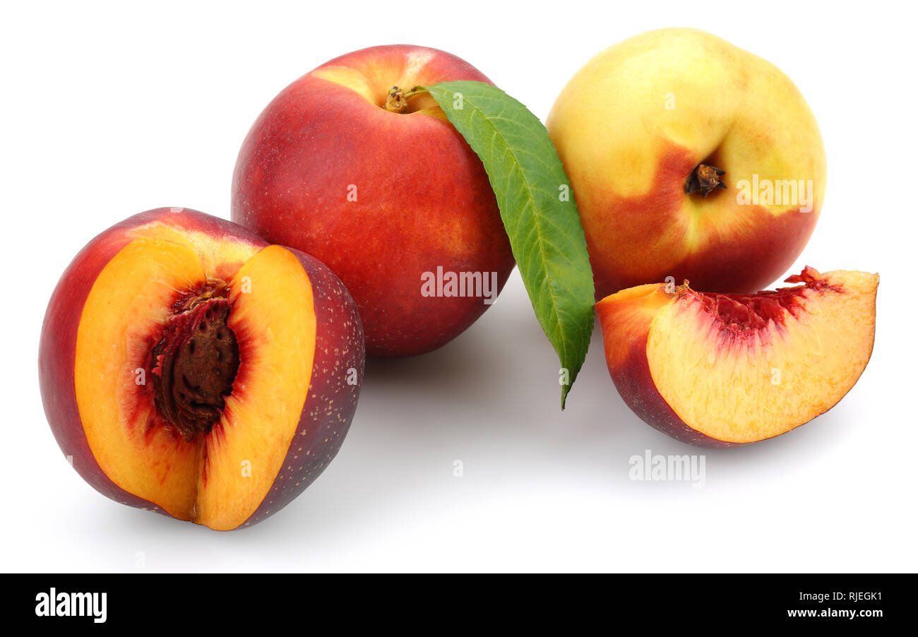 Nectarine peach with leaf isolated on white background Stock Photo - Alamy