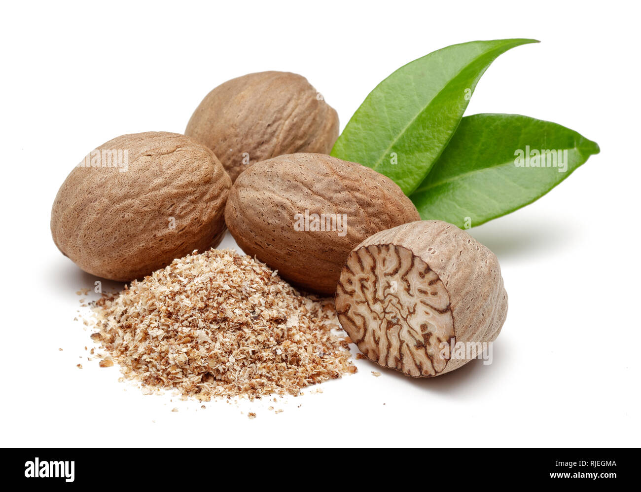 Whole and grated nutmeg with leaf isolated on white background Stock ...