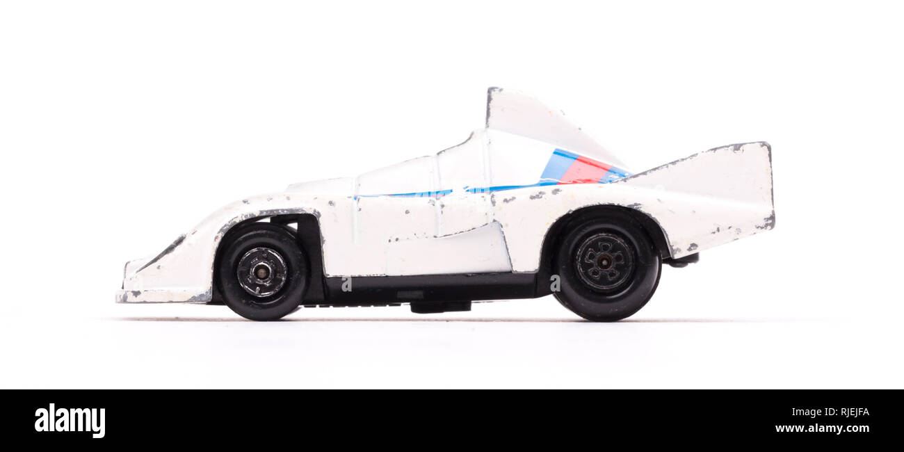White metal toy car, racecar, isolated on white Stock Photo - Alamy
