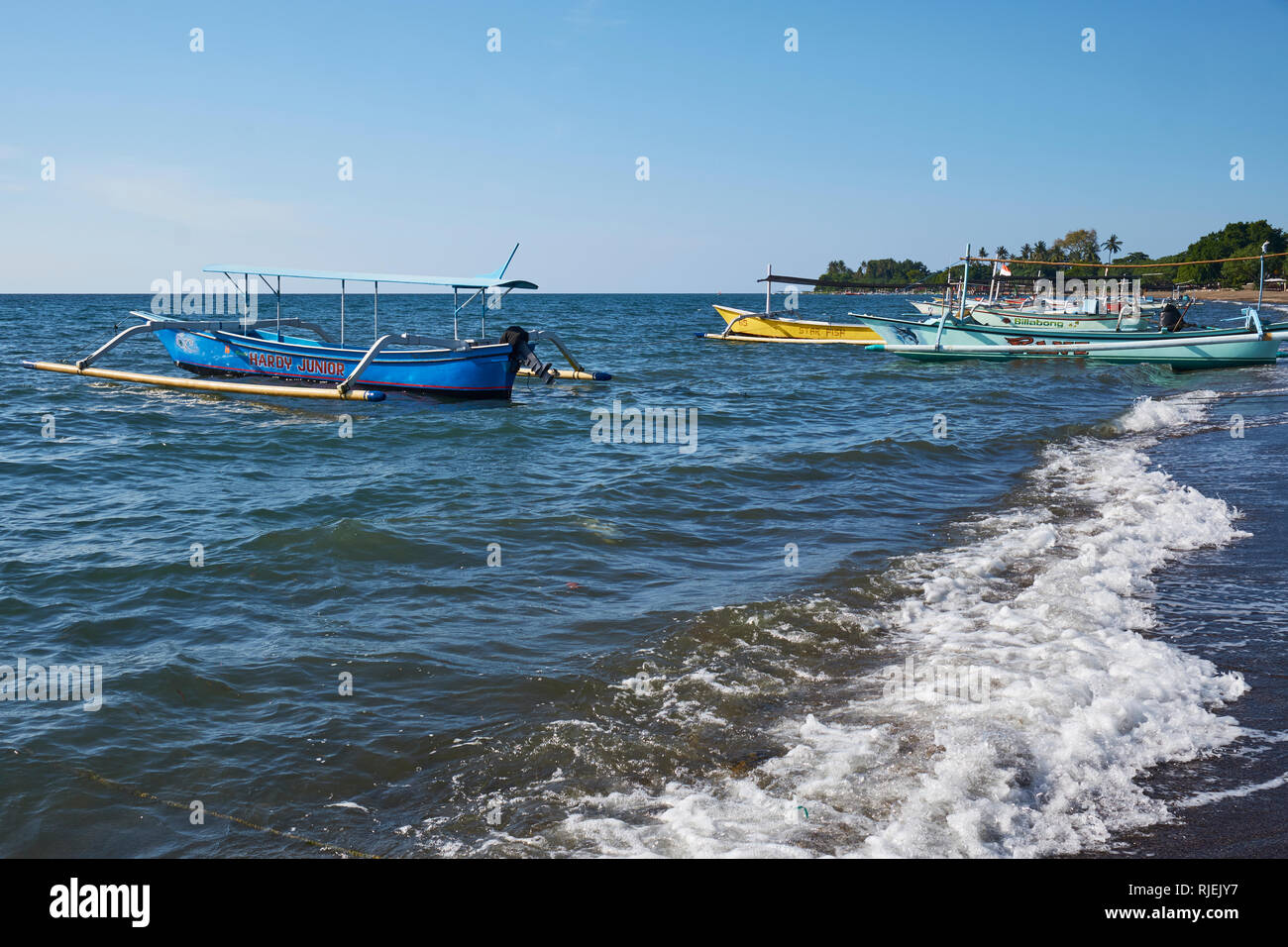 Traditional fishing boats on Lovina beach in North Bali Stock Photo - Alamy