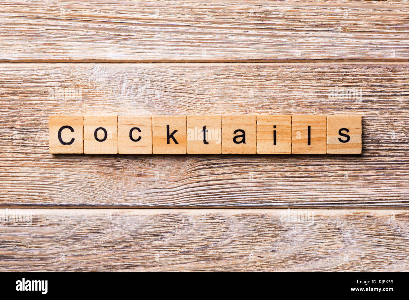 cocktails word written on wood block. cocktails text on wooden table ...