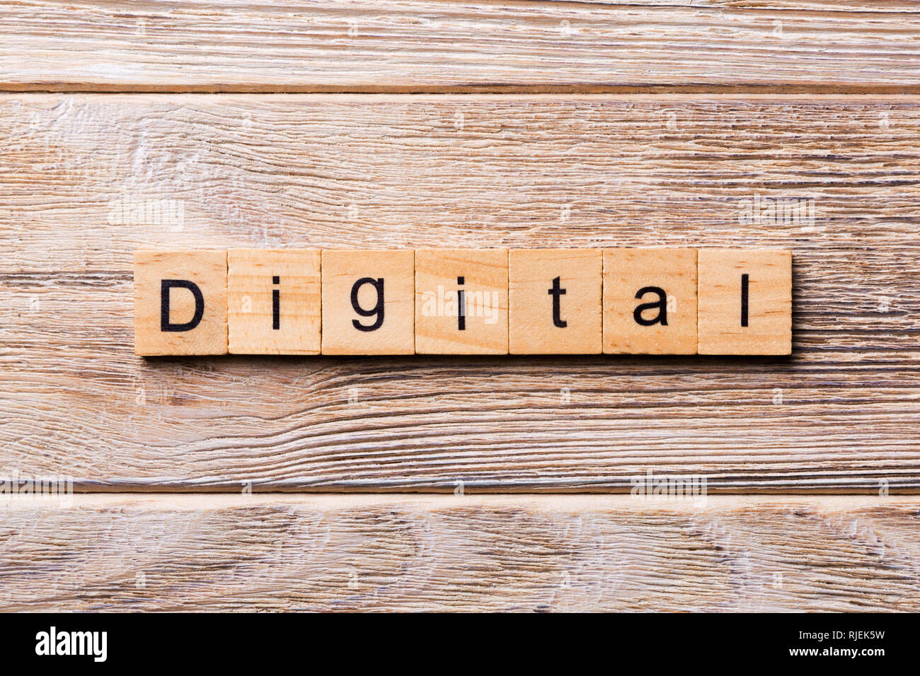 DIGITAL word written on wood block. DIGITAL text on wooden table for ...