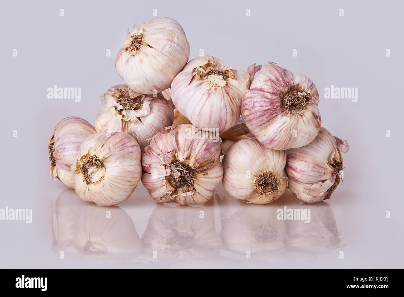 Garlic Bulbs isolated on a white background Stock Photo - Alamy