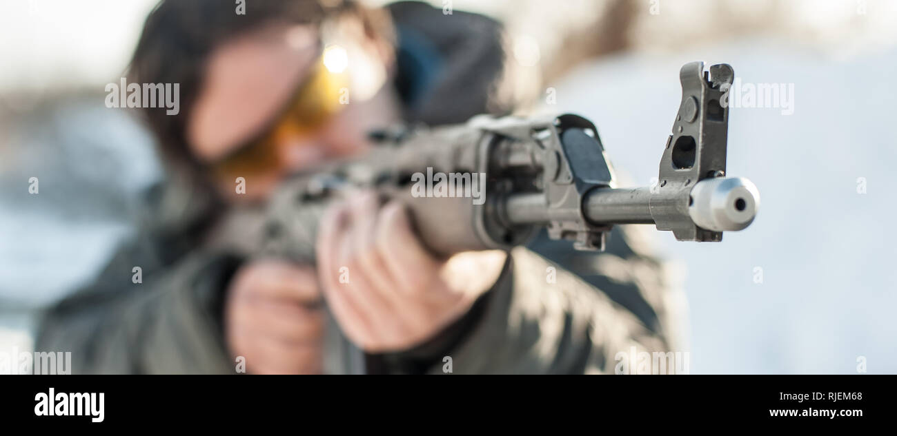 Front view gun point of riffle machine gun. Firearm shooting and ...