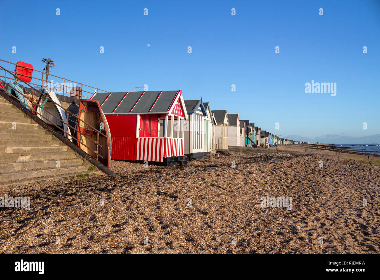Boats and beach huts on Thorpe Bay beach, near Southend-on-Sea, Essex ...