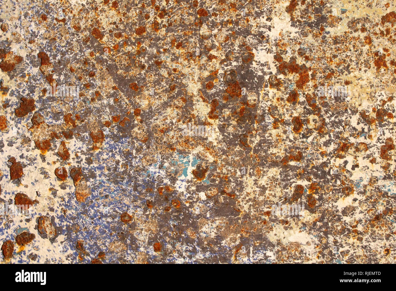 Closeup image showing the textures and colours of rust and peeling ...