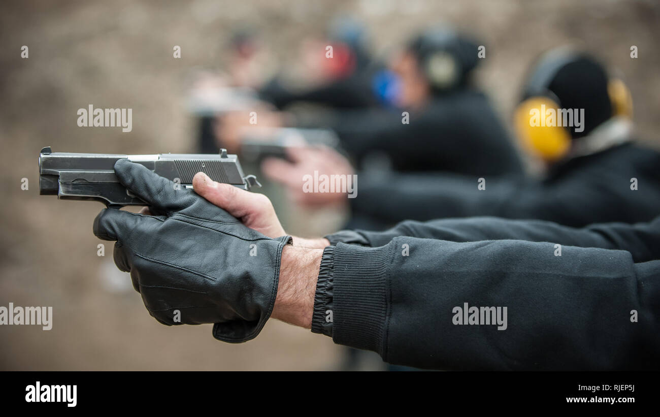 Hold gun hi-res stock photography and images - Alamy