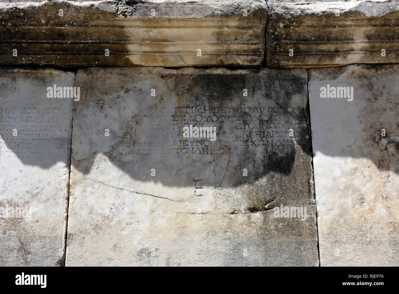 Ancient Greek inscriptions line the Propylon, the entrance to the ...