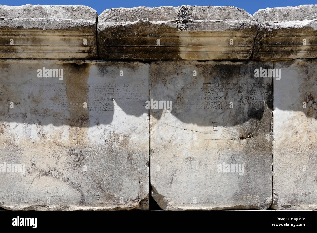 Ancient Greek inscriptions line the Propylon, the entrance to the ...