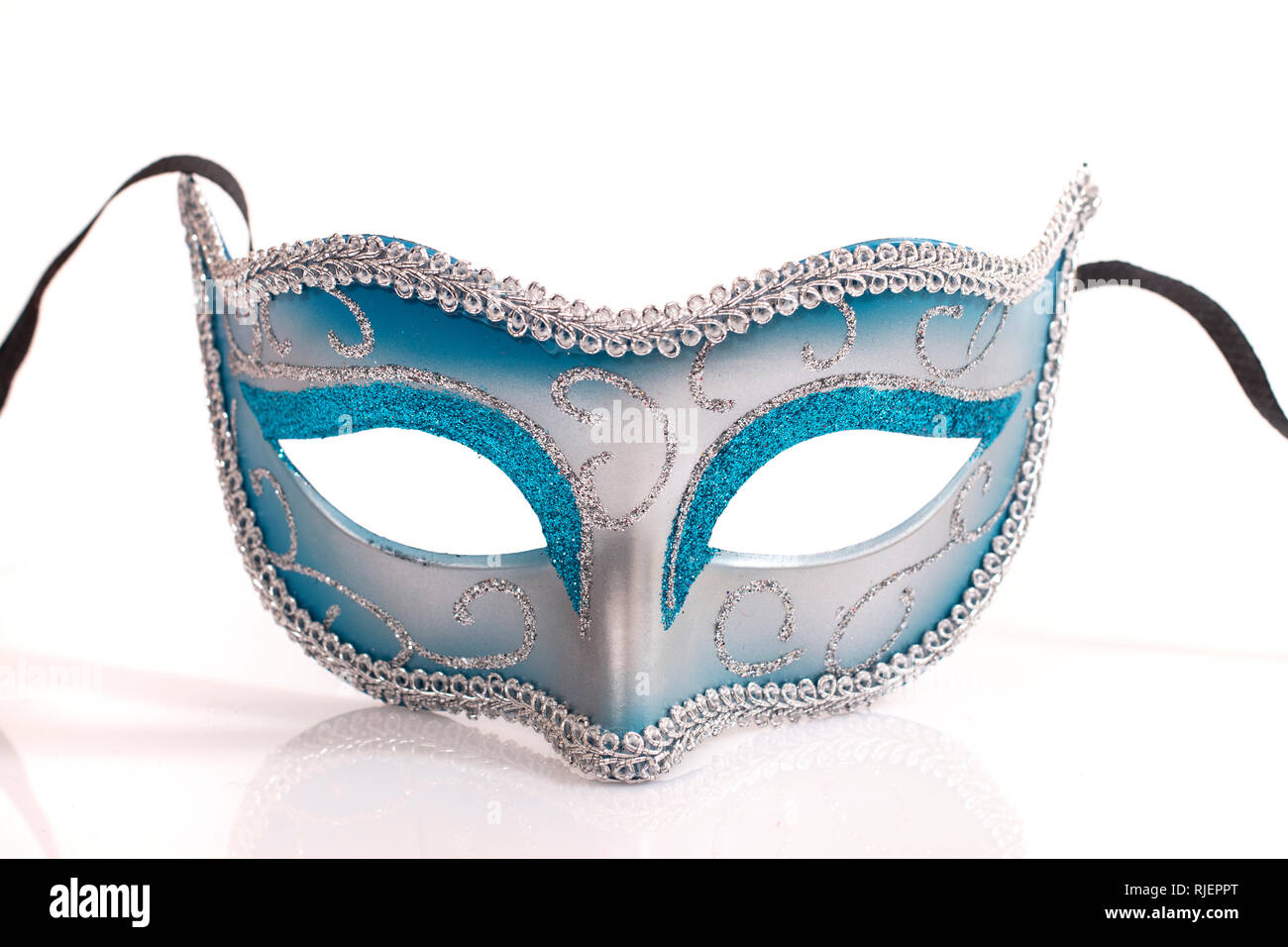 blue venetian mask isolated on a white background Stock Photo - Alamy