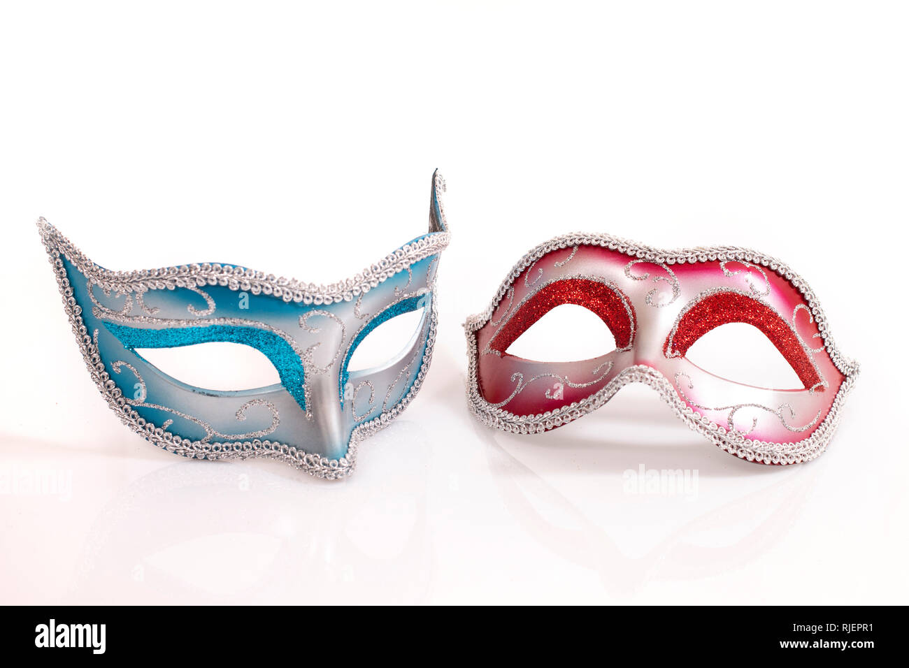 blue and red venetian masks isolated on a white background Stock Photo ...