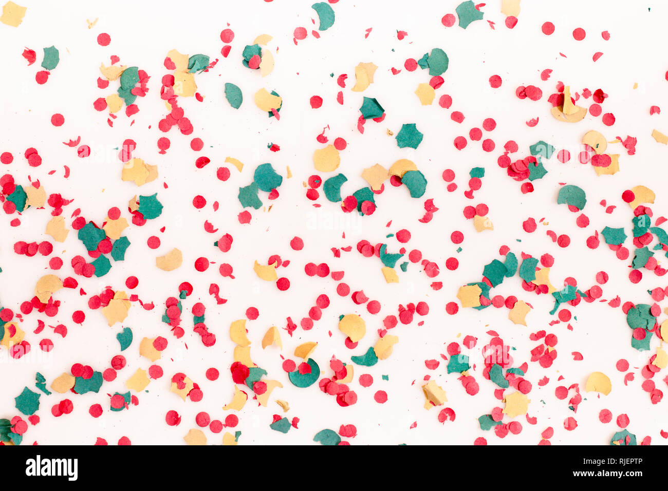 Mixed colorful confetti scattered on a white background Stock Photo - Alamy