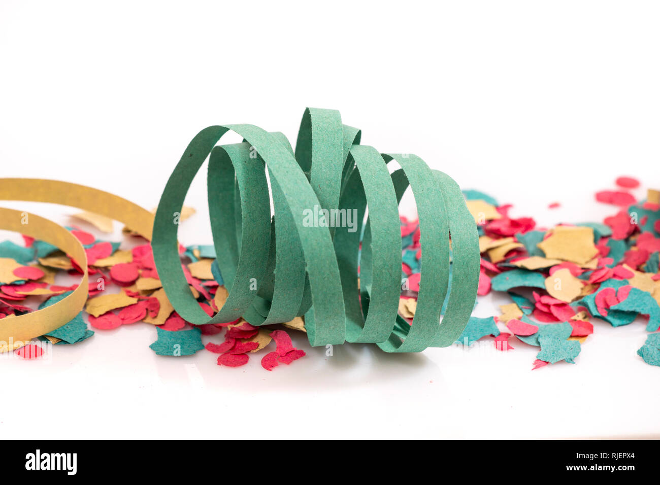 Mixed colorful confetti and streamers on a white background Stock Photo ...