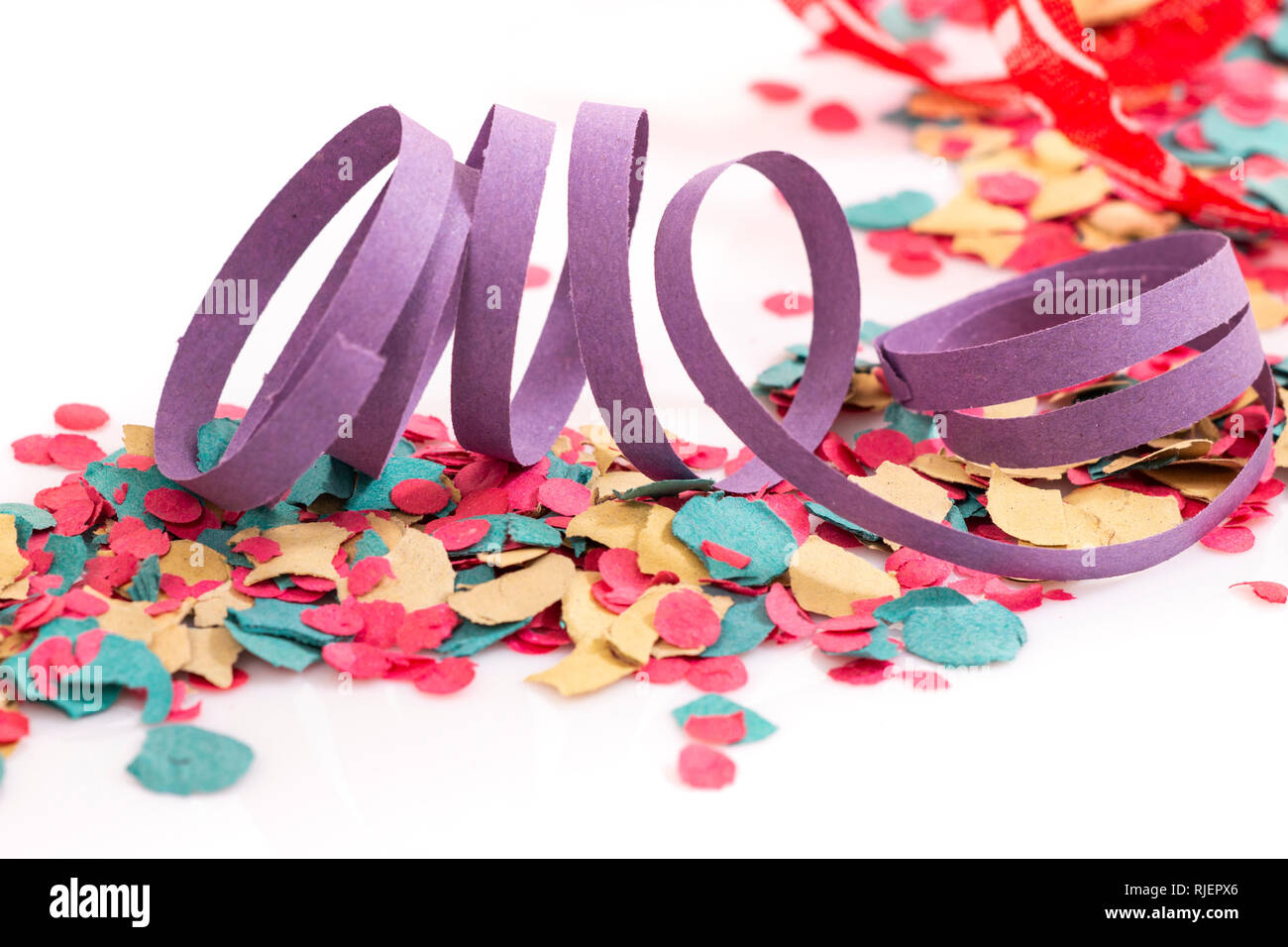 Mixed colorful confetti and streamers on a white background Stock Photo ...