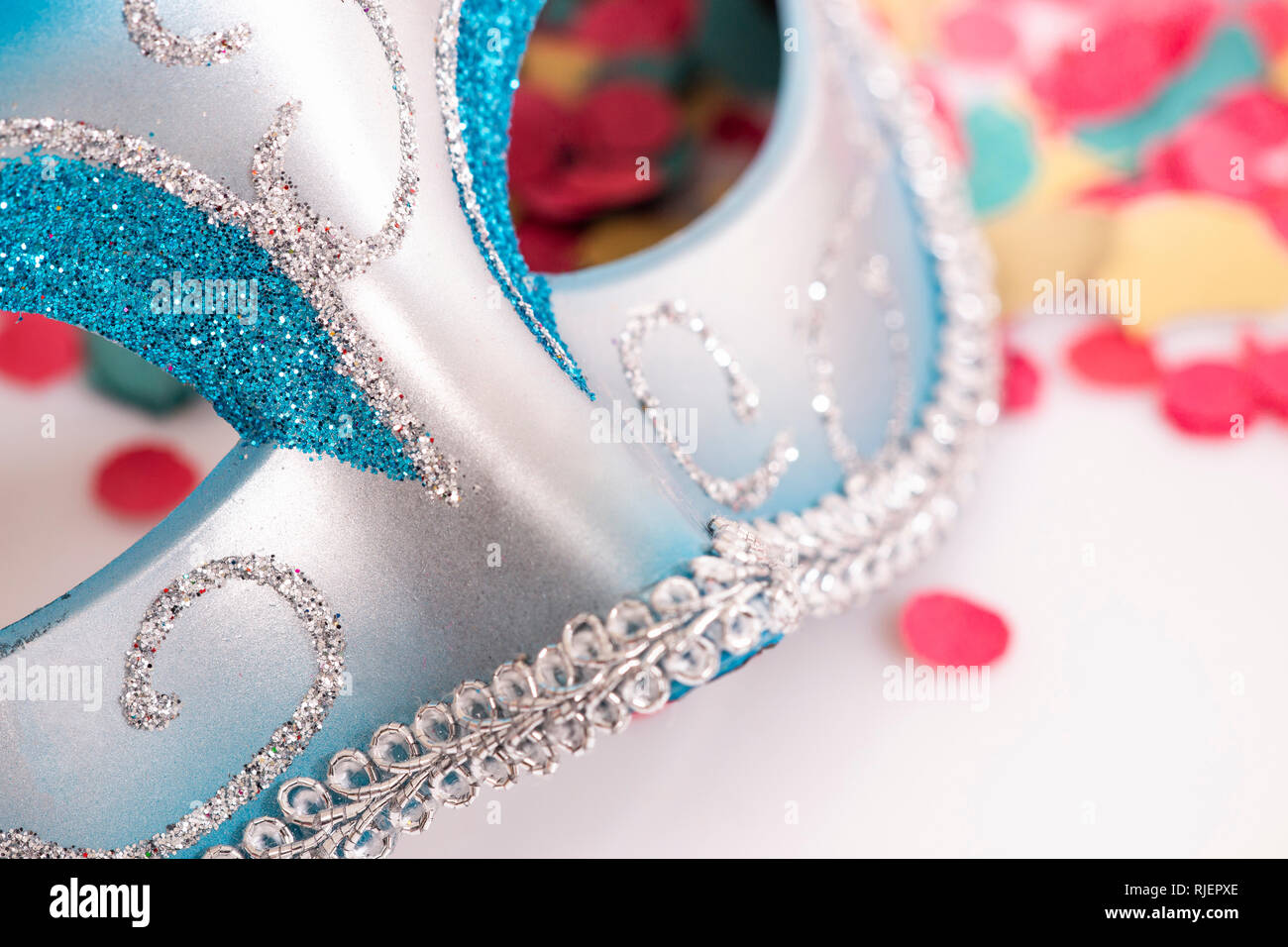 blue venetian mask isolated on a white background Stock Photo - Alamy