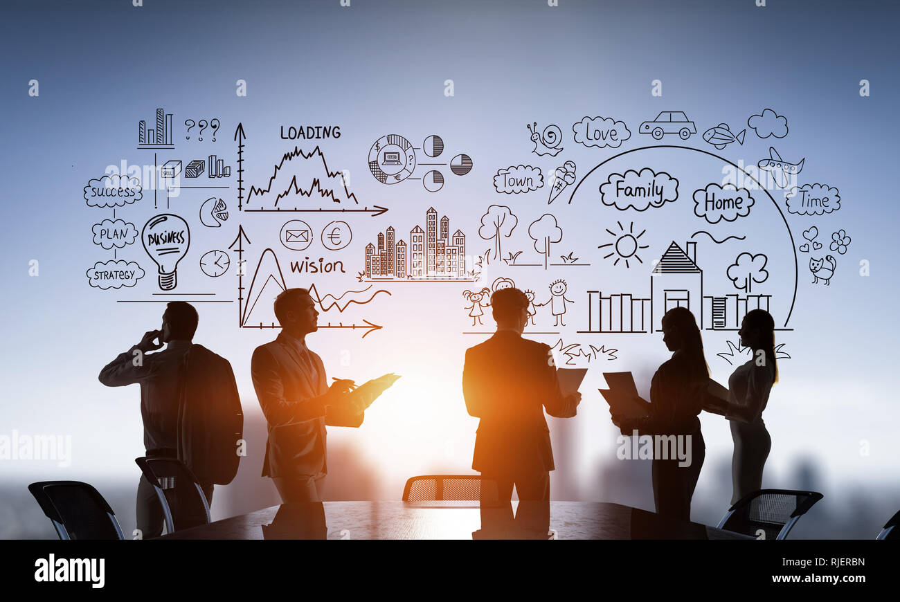 Silhouettes of business people near table working at strategy Stock ...