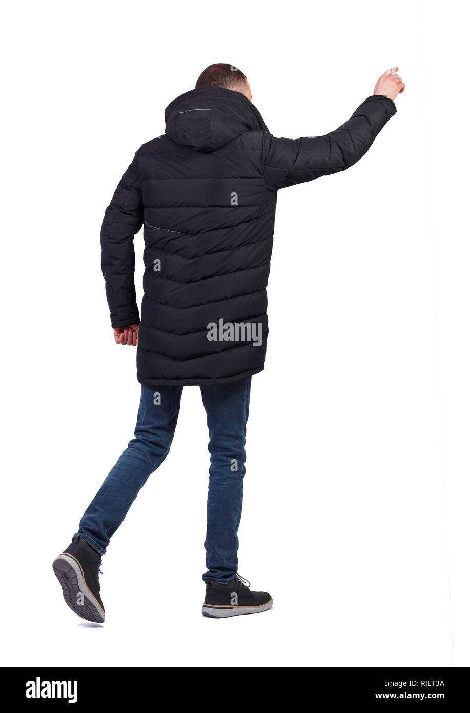 Back view of a man walking with a pointing hand. going guy showing ...