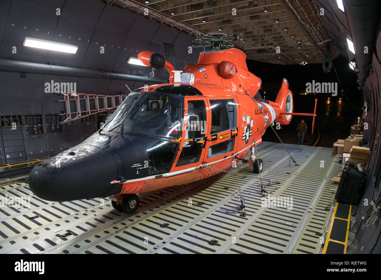 A Coast Guard Air Station San Fransisco MH-65D Dolphin helicopter sits ...