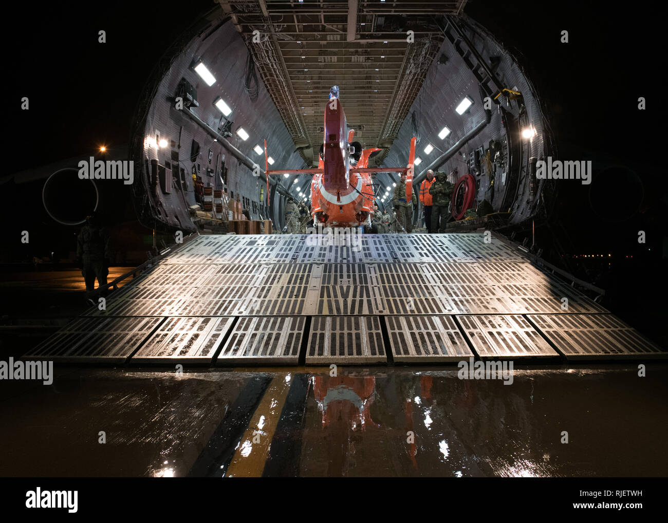 A Coast Guard Air Station San Fransisco MH-65D Dolphin helicopter sits ...