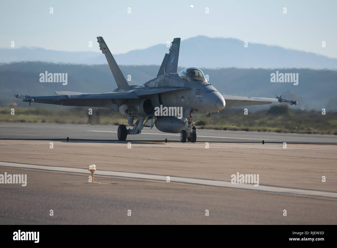 An F/A-18C Hornet with Marine Aircraft Group (MAG) 11, prepares for ...
