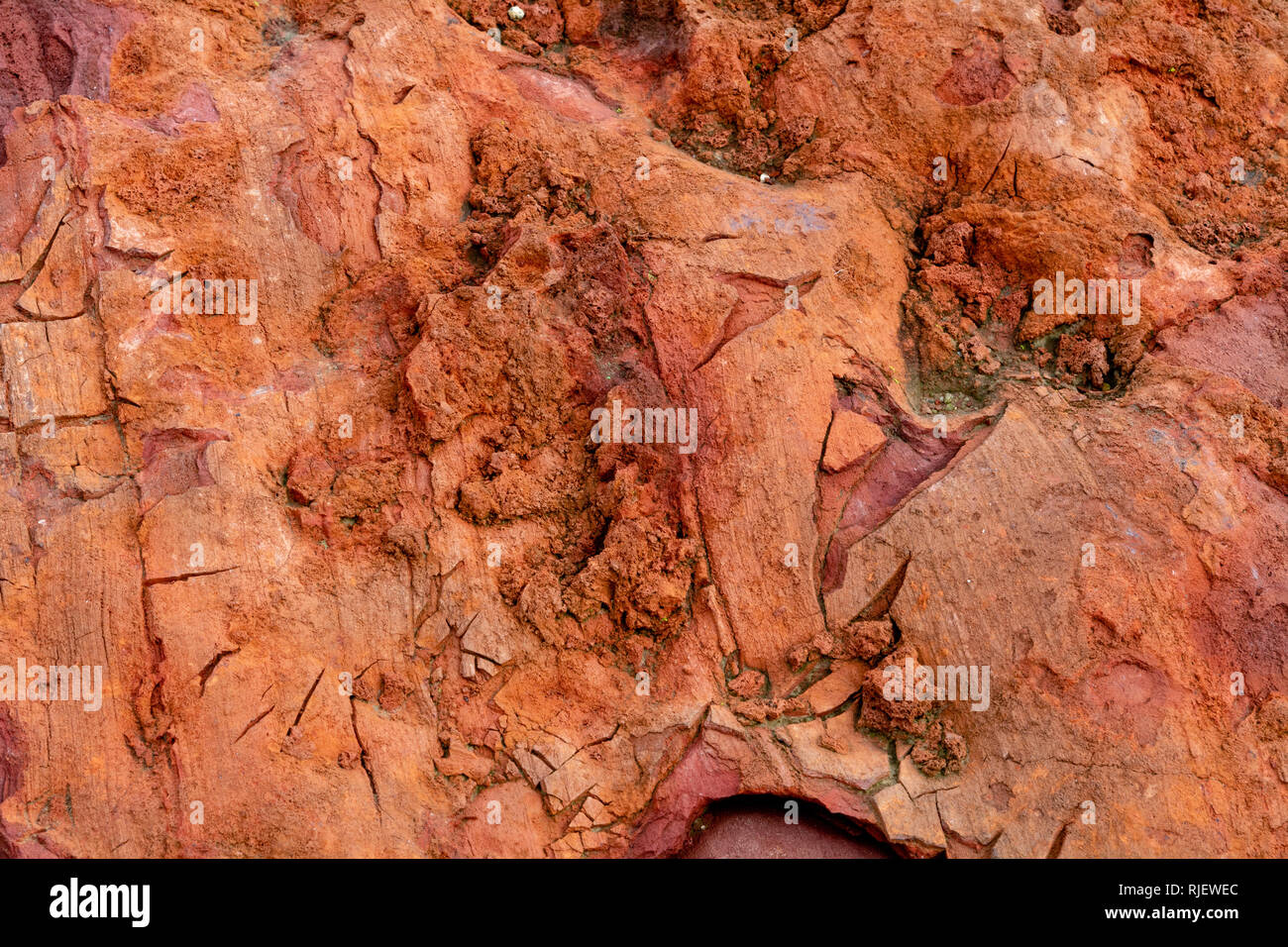 A volcanic bomb is formed when a volcano ejects lava fragments that ...