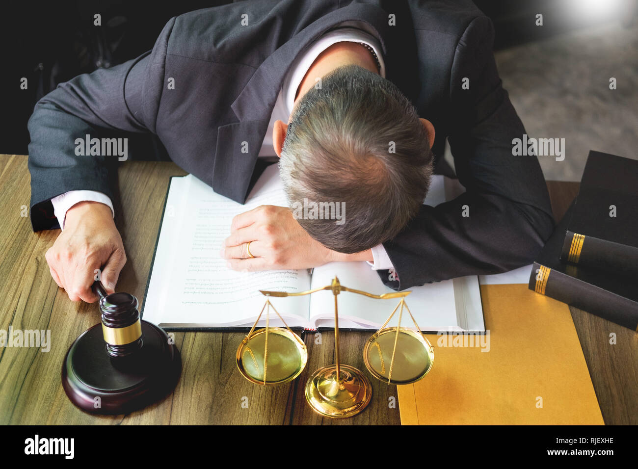 lawyer tried or stress from hard working Stock Photo - Alamy