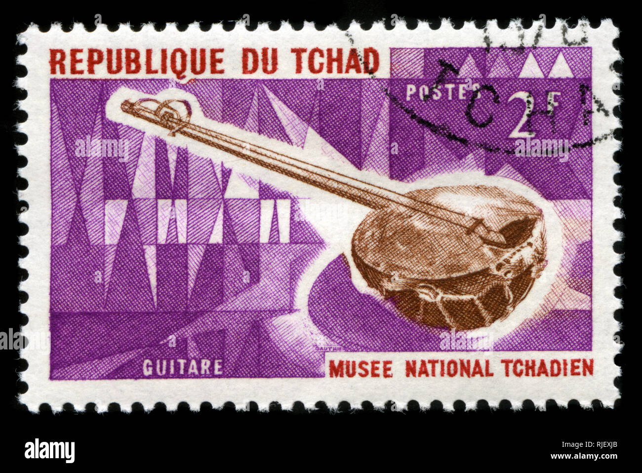 Postmarked stamp from Chad in the Musical instruments series issued in ...