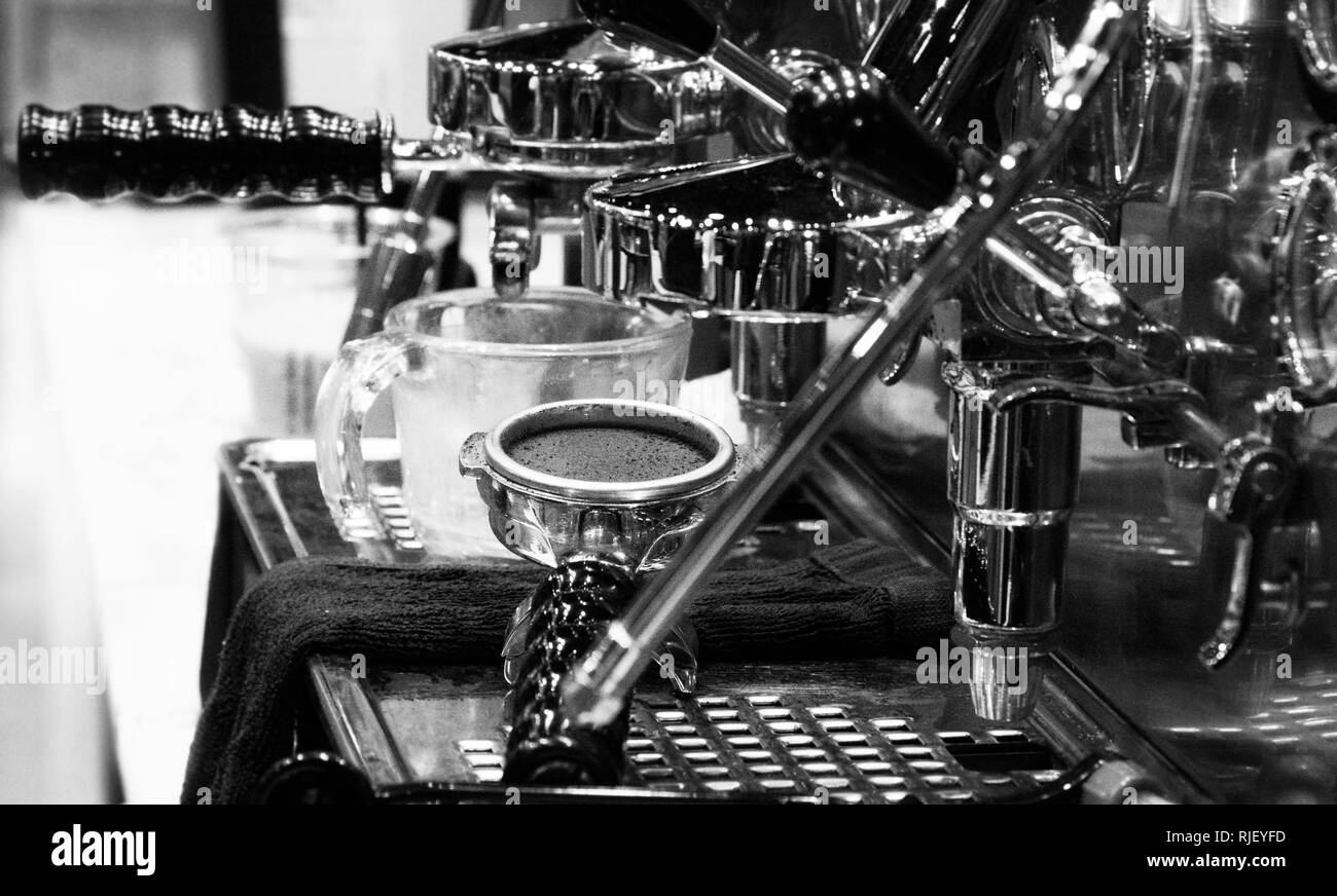 Espresso shot from coffee machine in coffee shop,Coffee maker in coffee ...