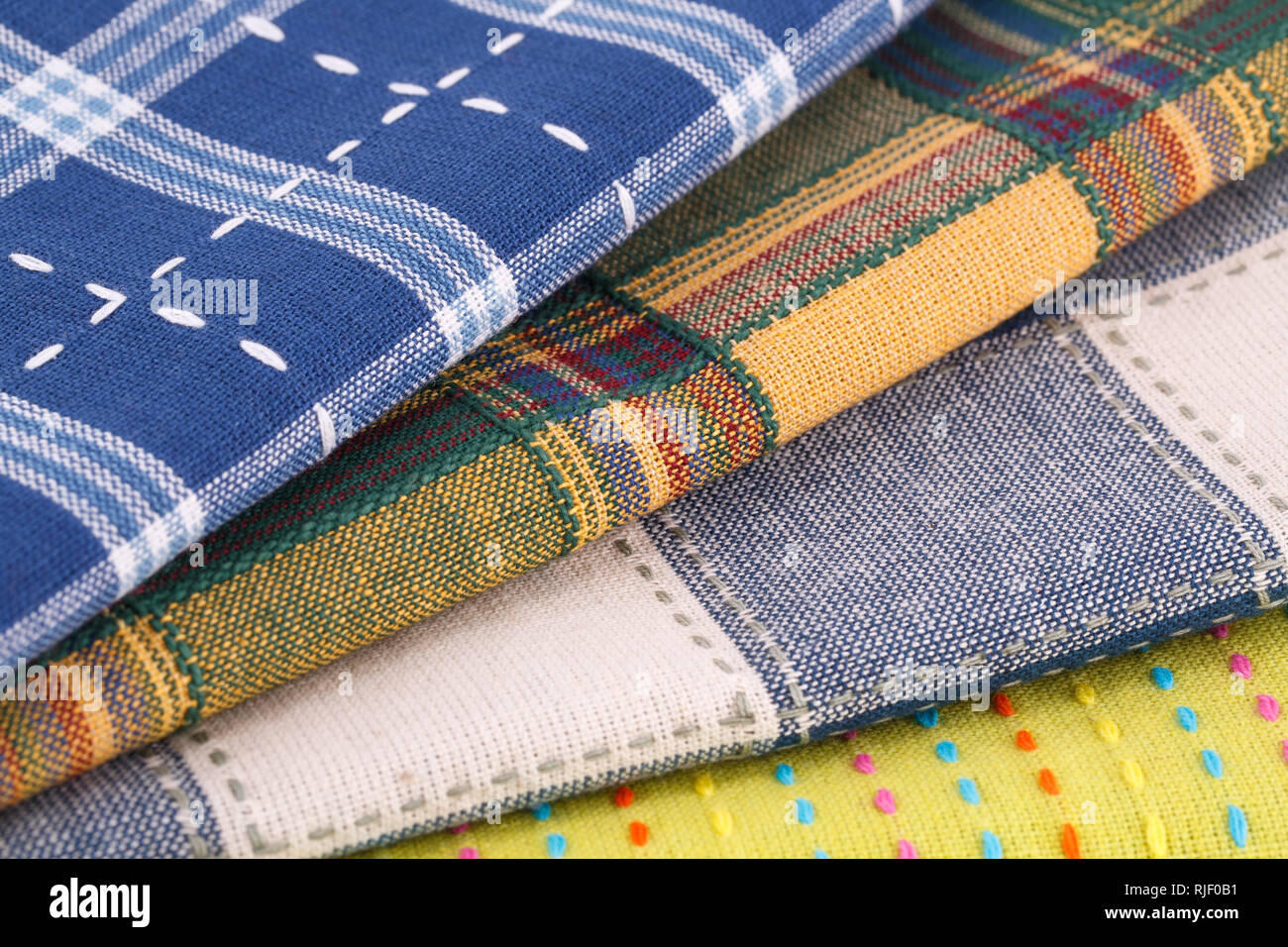 Stack of colorful kitchen towels closeup picture Stock Photo - Alamy