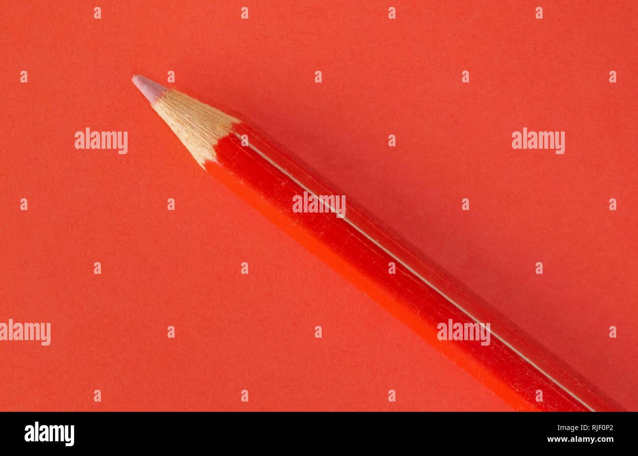 One red pencil on red background ,beautiful monochromatic effect Stock ...