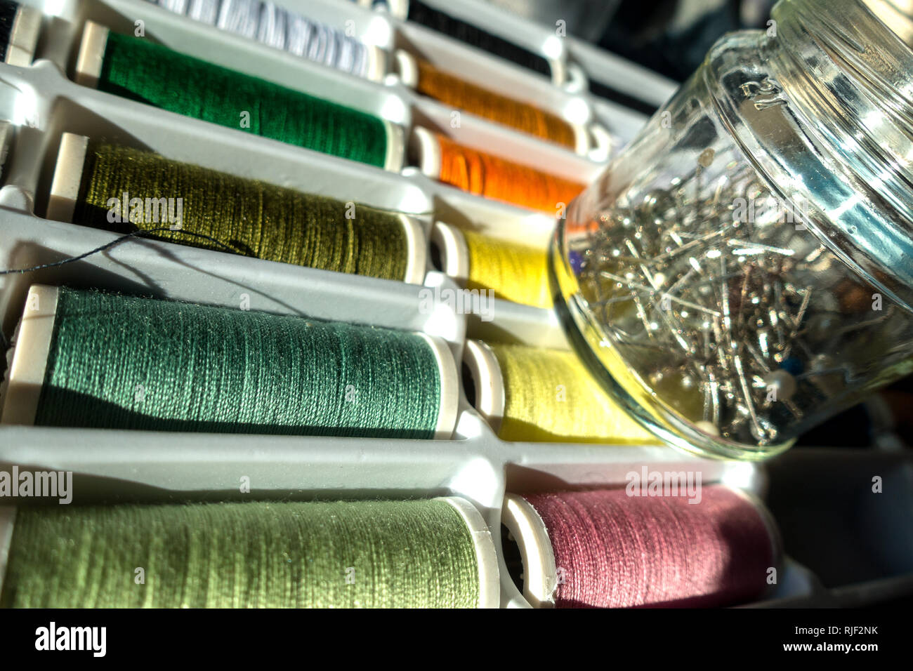 sewing spools of coloured threads UK Stock Photo - Alamy
