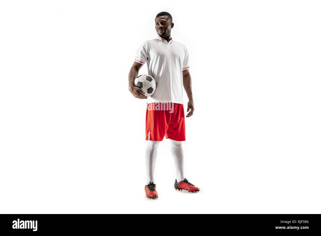 Professional african american football soccer player standing isolated ...