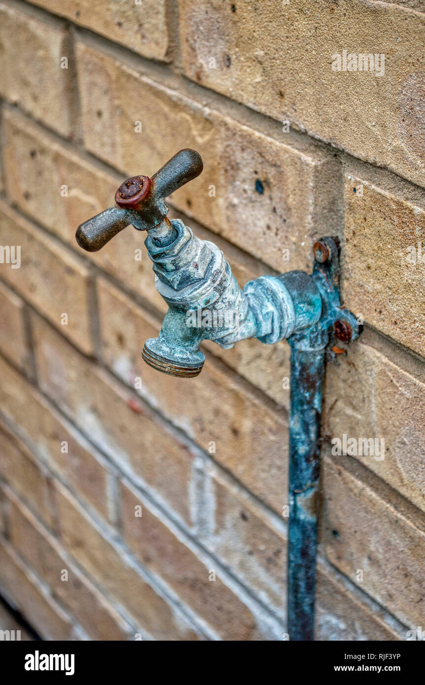 Wall mounted tap hi-res stock photography and images - Alamy