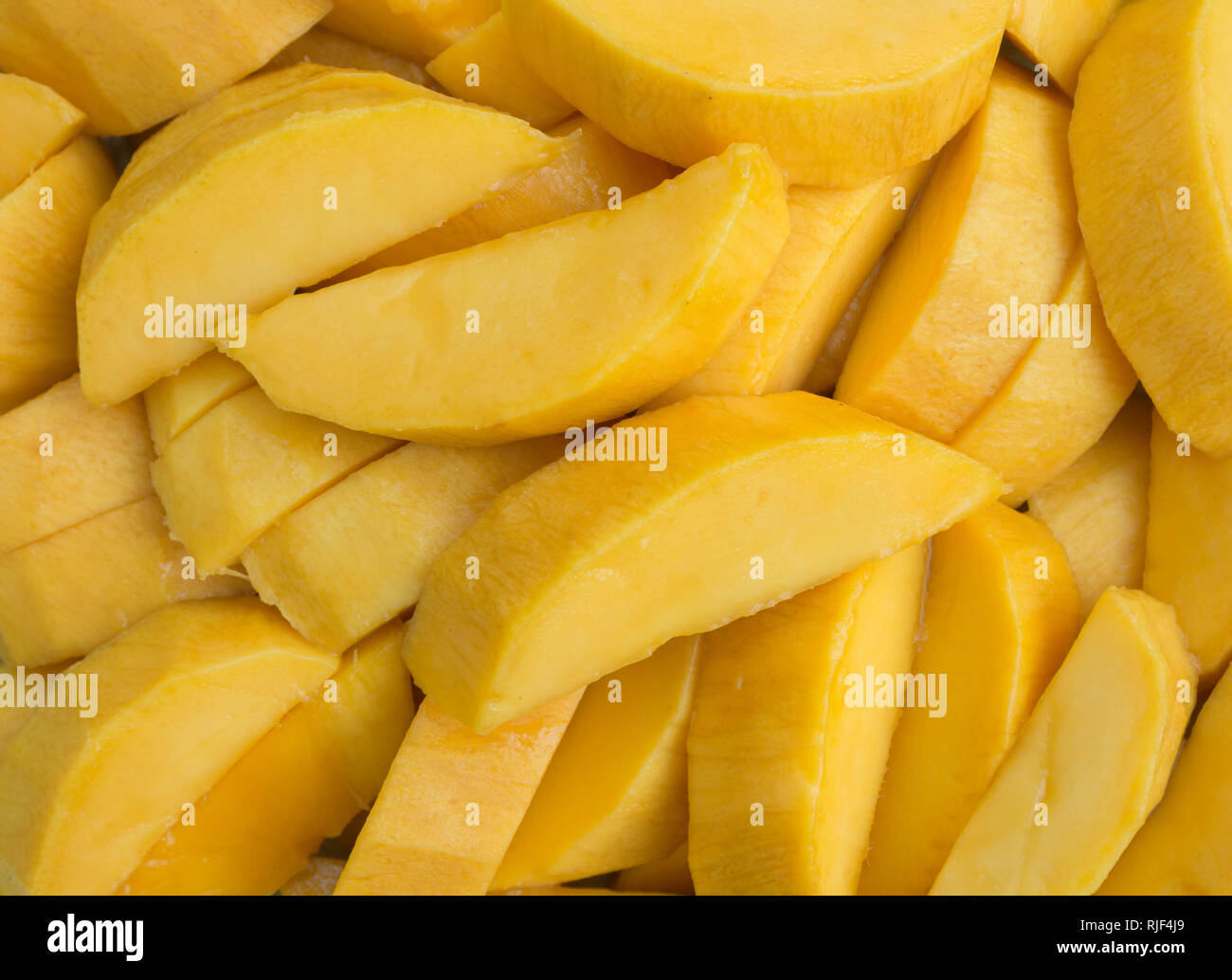 Mango cut slices on plate hi-res stock photography and images - Alamy