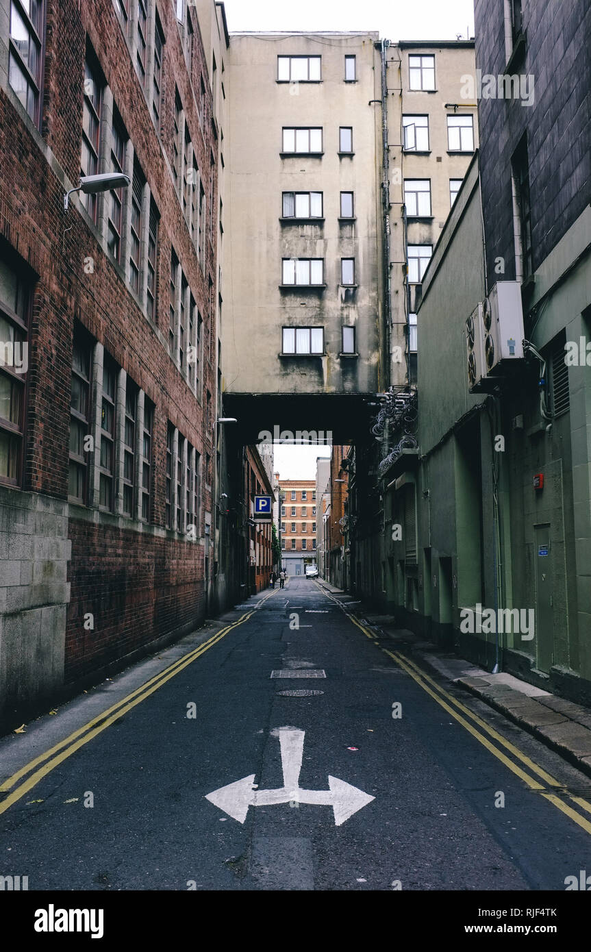 City scenery with an alley and an underpass Stock Photo - Alamy