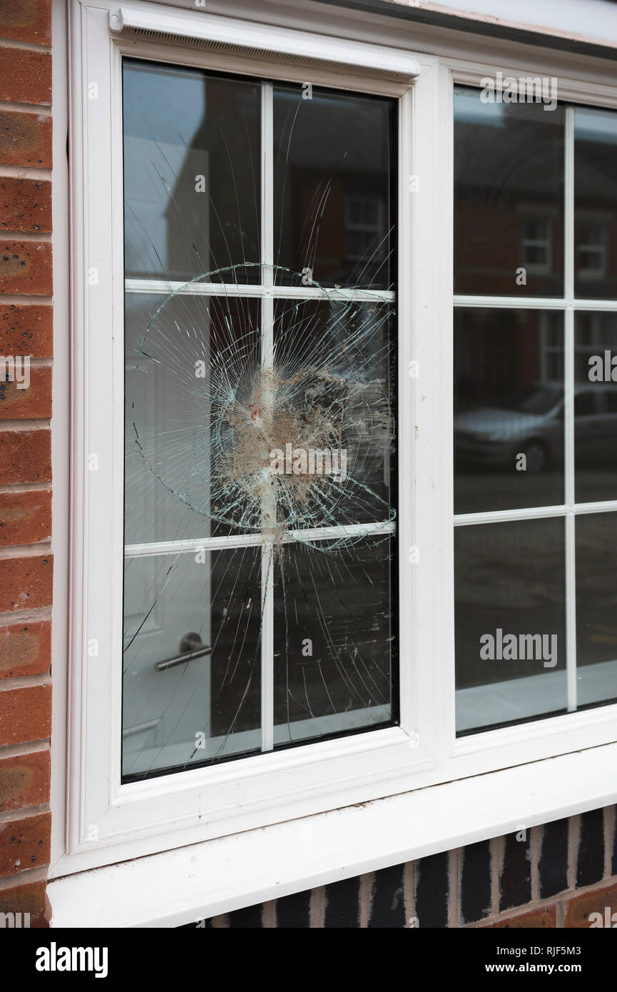Shattered House Window