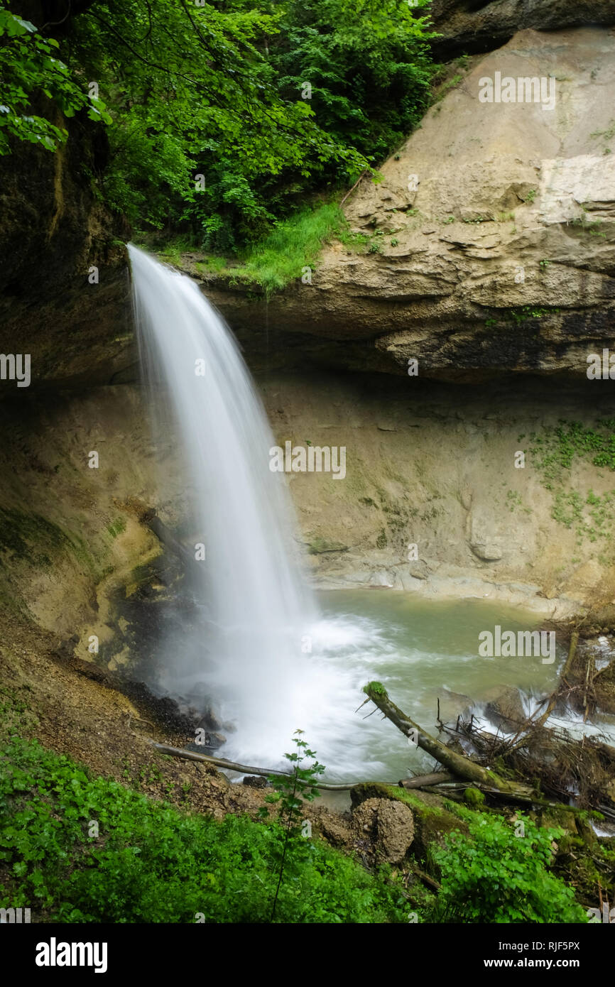 a beautiful small waterfall in a green forest in Bavaria Germany Stock ...