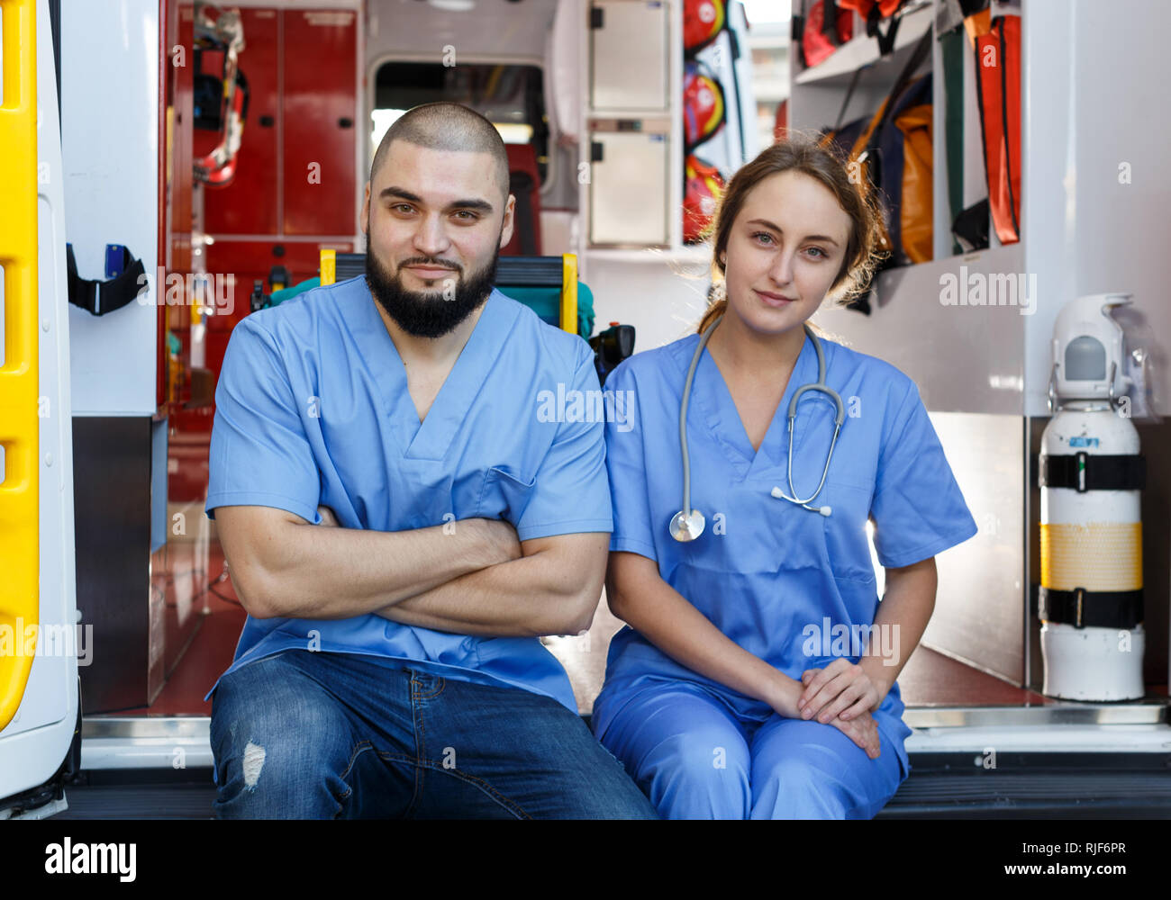 Paramedic sitting in ambulance hi-res stock photography and images - Alamy