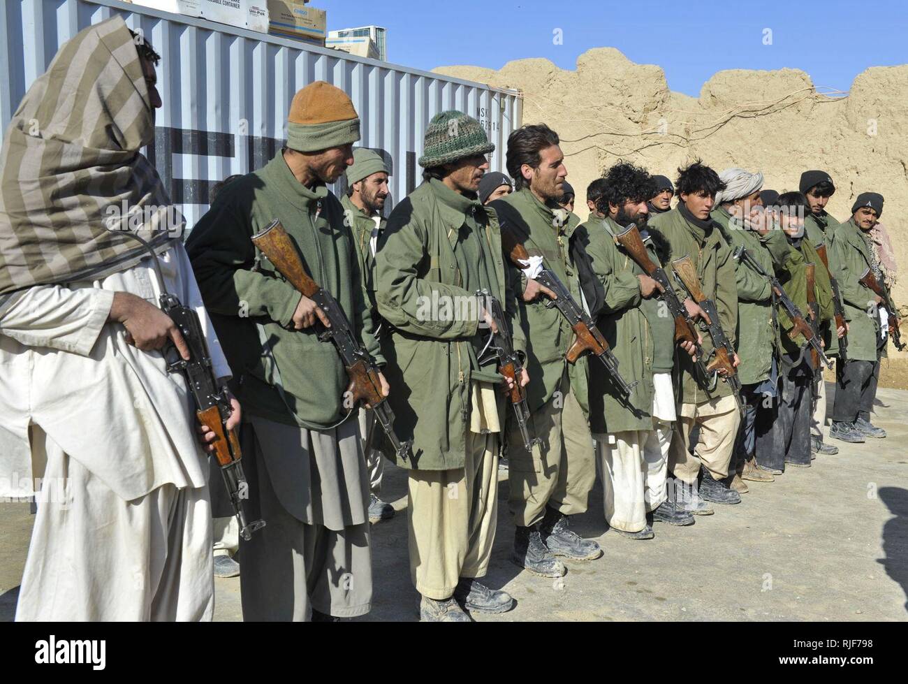 Afghan Local Police candidates line up in formation during a training ...